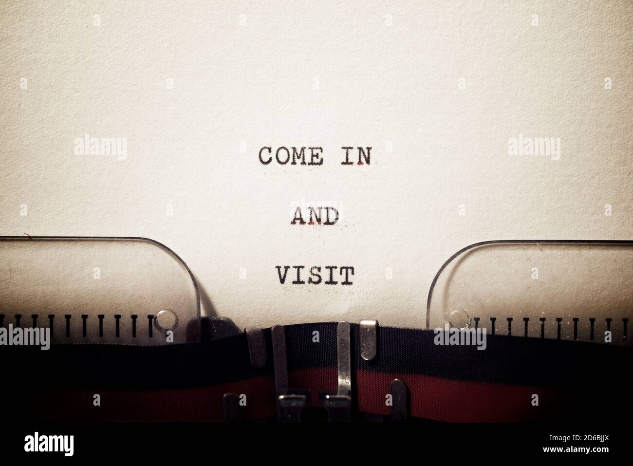 Come in and visit phrase written with a typewriter Stock Photo - Alamy