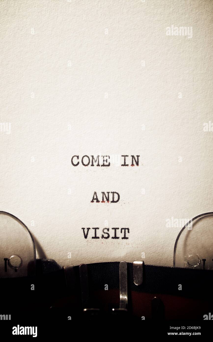 Come in and visit phrase written with a typewriter Stock Photo - Alamy