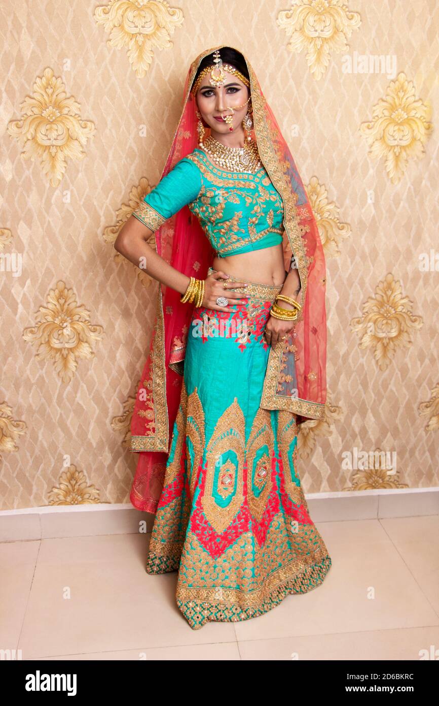 Indian model wearing traditional Maharashtrian bridal green sari and ...
