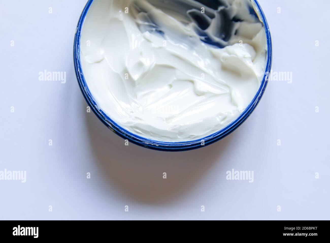 Cosmetic cream white texture in plastic container Stock Photo - Alamy