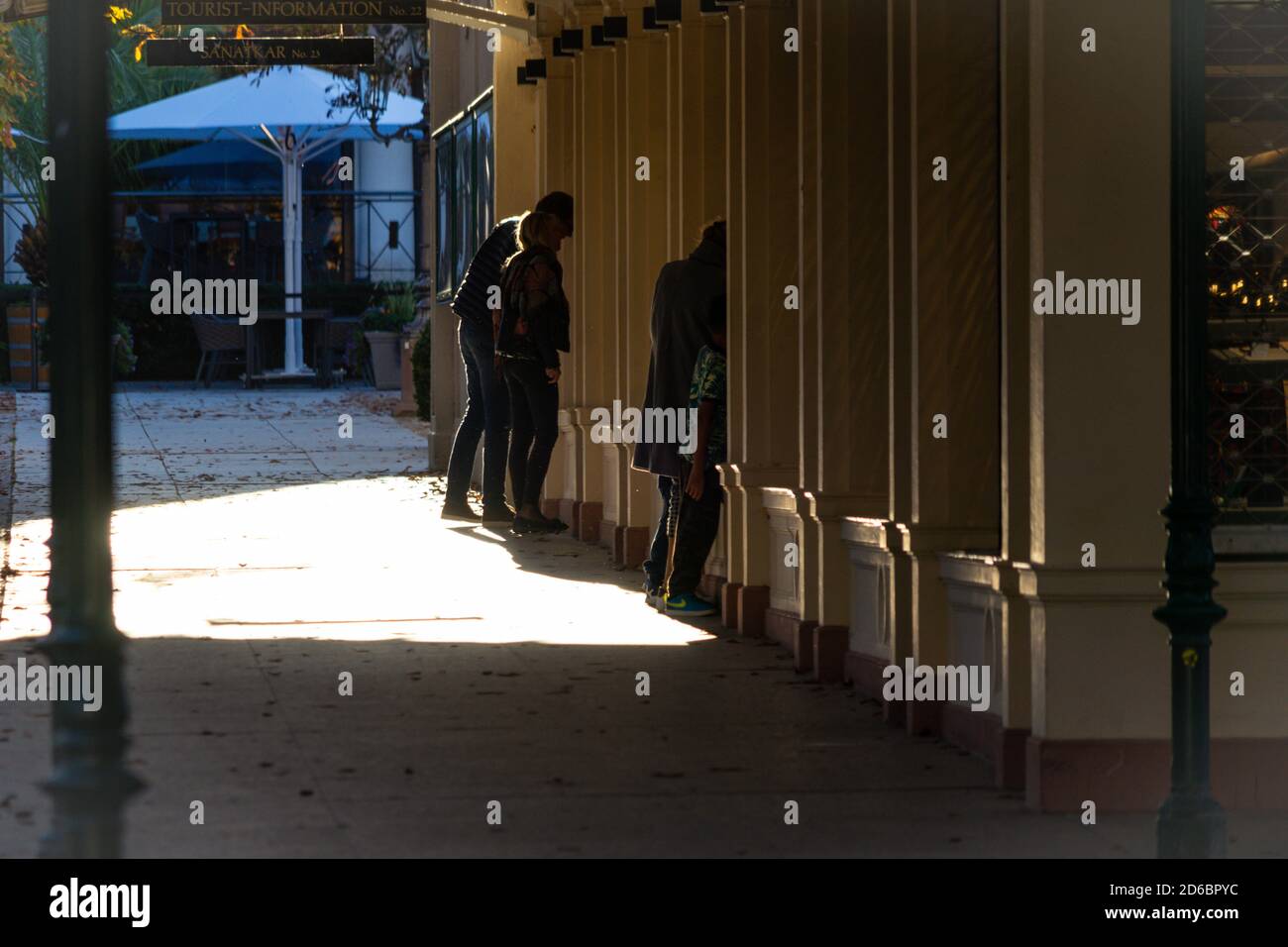 People gazing into shop windows in an arcade in Baden-Baden Stock Photo ...