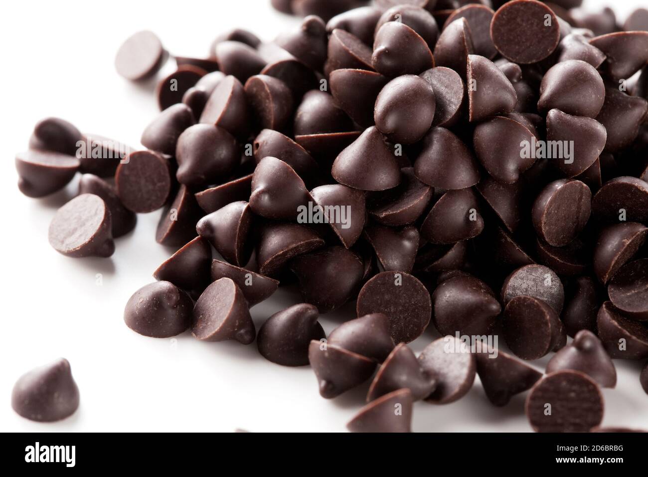 Chocolate chips was placed on a white background Stock Photo - Alamy