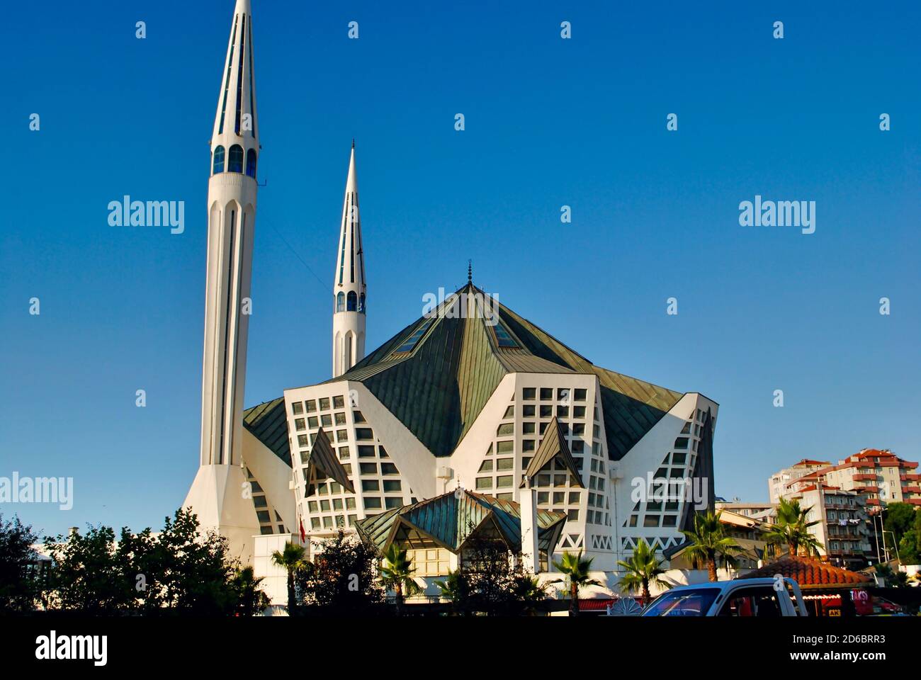The unusual style exterior of Akcakoca Central Mosque against blue sky ...