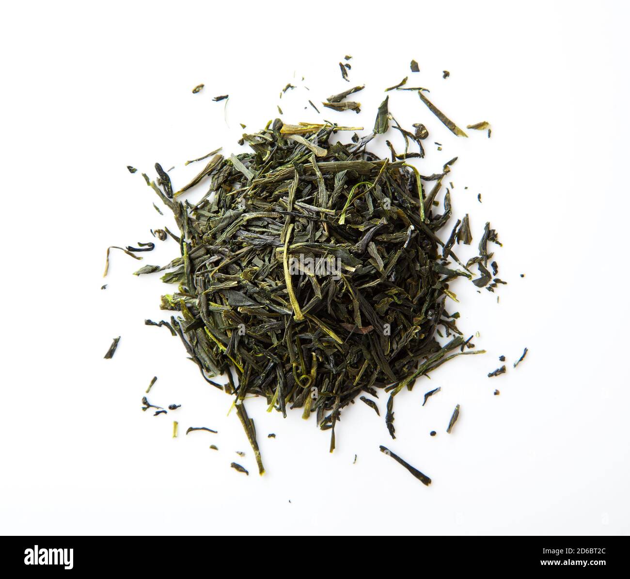 Taking a bird's eye view of tea leaves placed on a white background ...