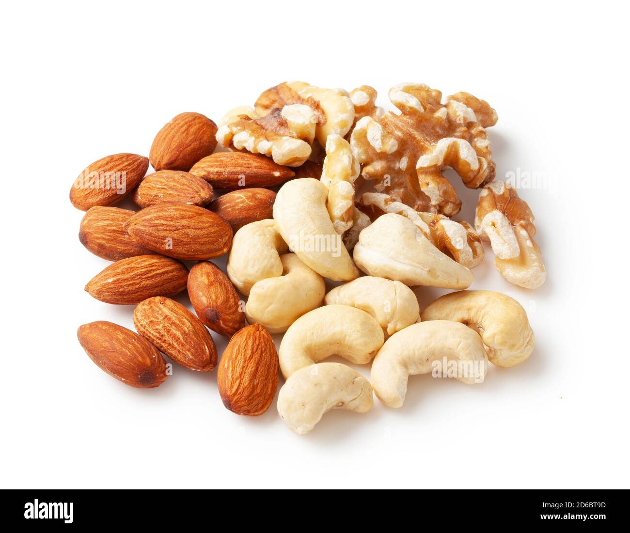 Angled shot of nuts placed on a white background Stock Photo - Alamy