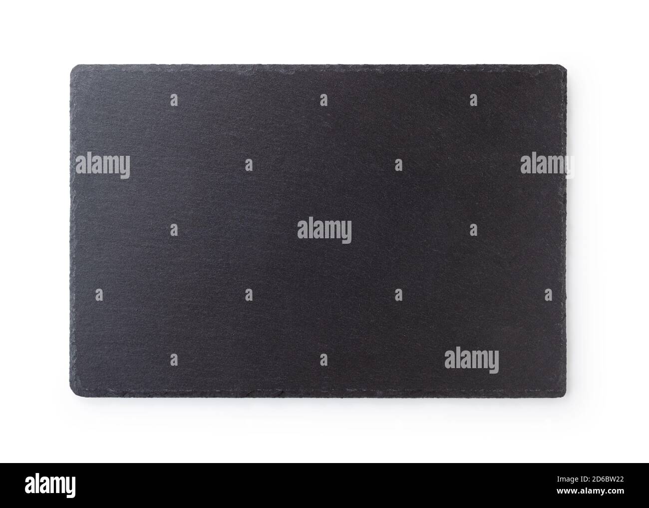 A bird's eye view of a black stone plate placed on a white background ...