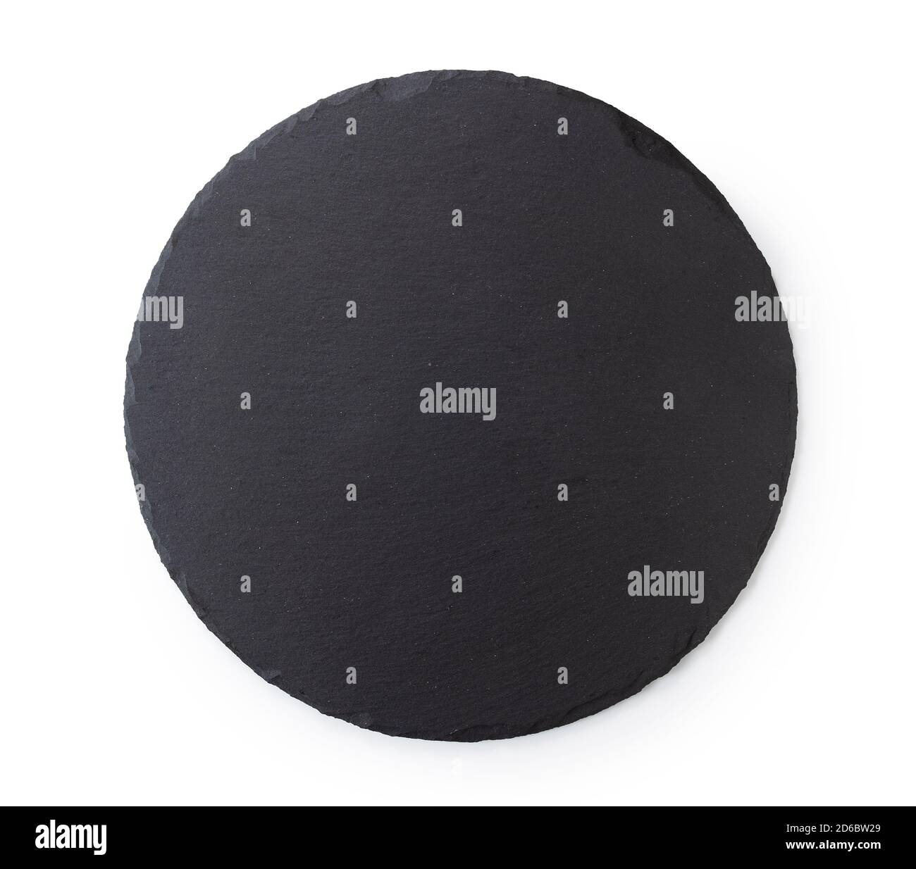 A bird's eye view of a black stone plate placed on a white background ...