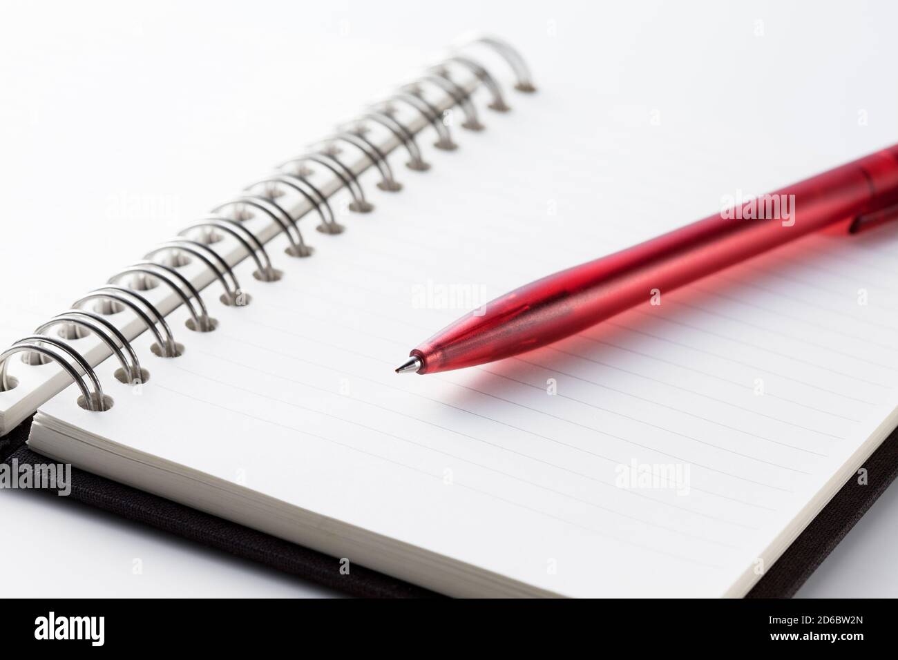 pen over note book Stock Photo - Alamy