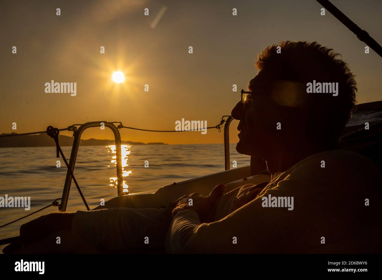Sunset seen from a travelling sailboat,Cyclades,Greece Stock Photo - Alamy