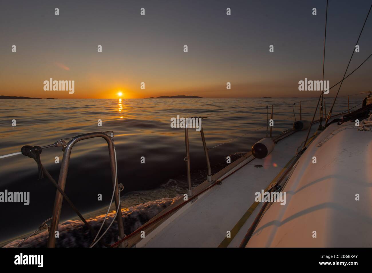 Sunset seen from a travelling sailboat,Cyclades,Greece Stock Photo - Alamy