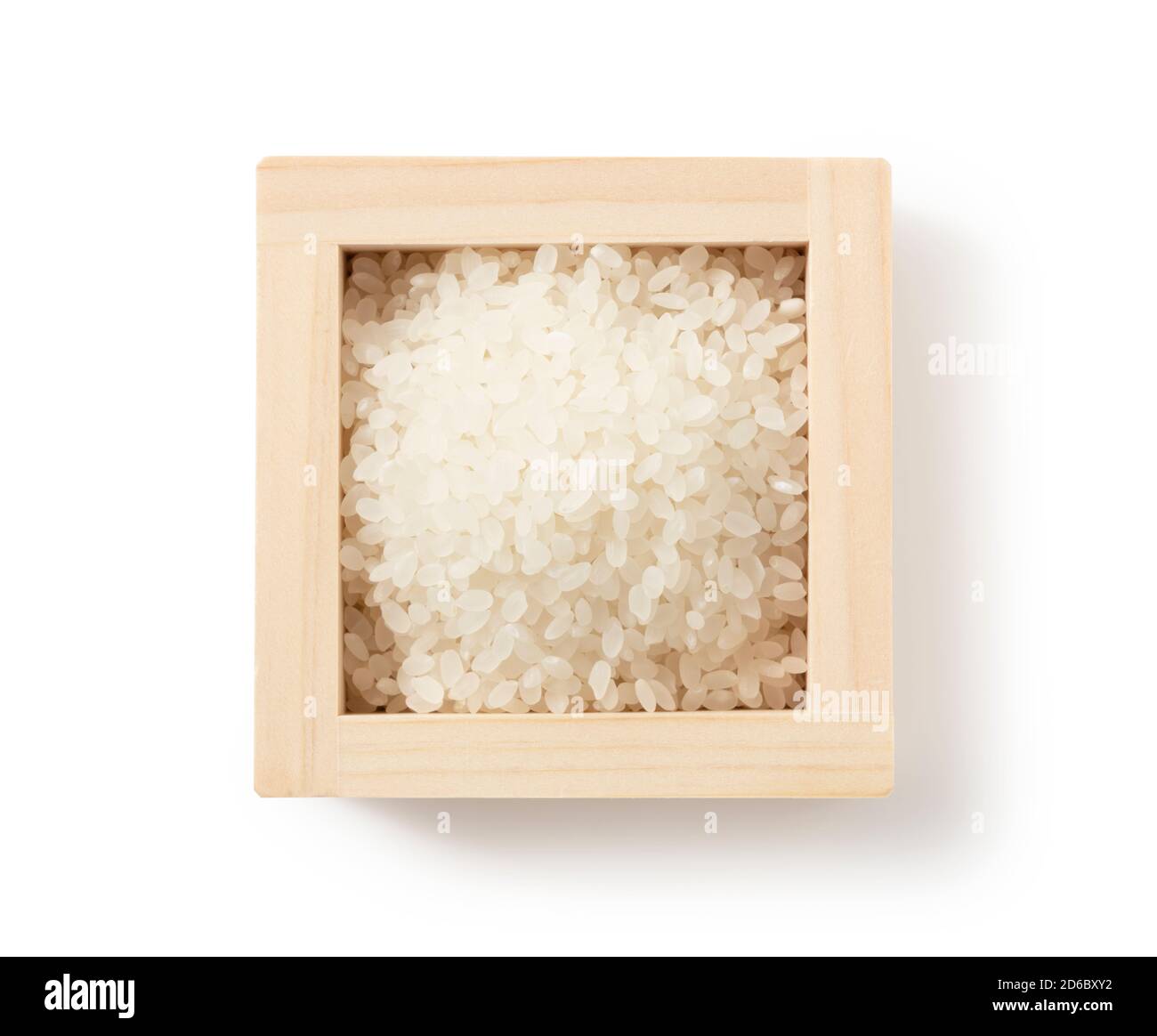 Rice in a Japanese Masu box on a white background Stock Photo - Alamy