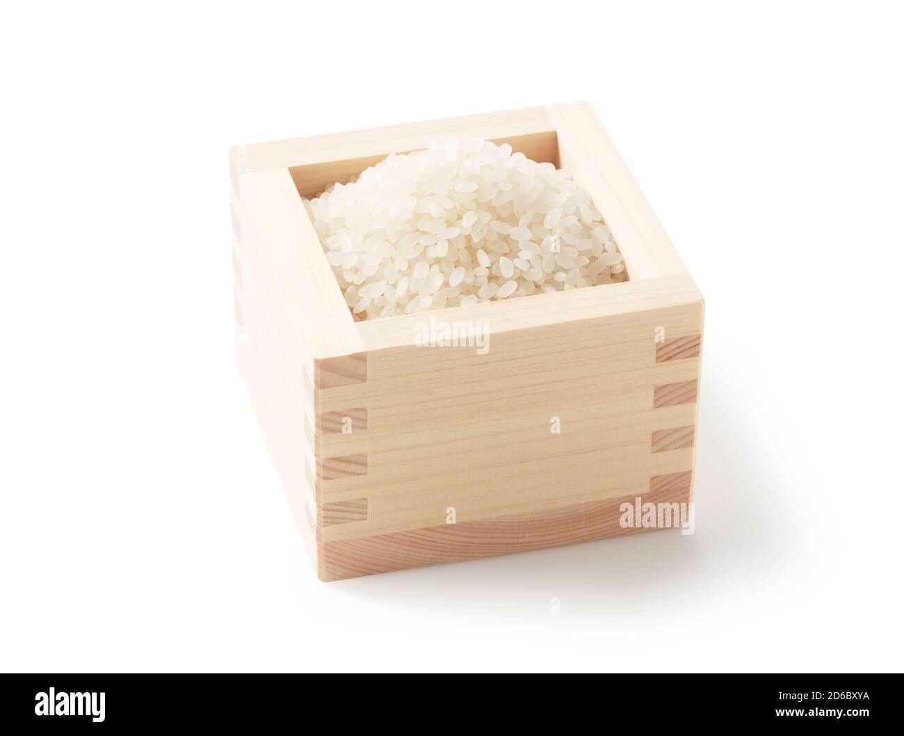 Rice in a Japanese Masu box on a white background Stock Photo - Alamy