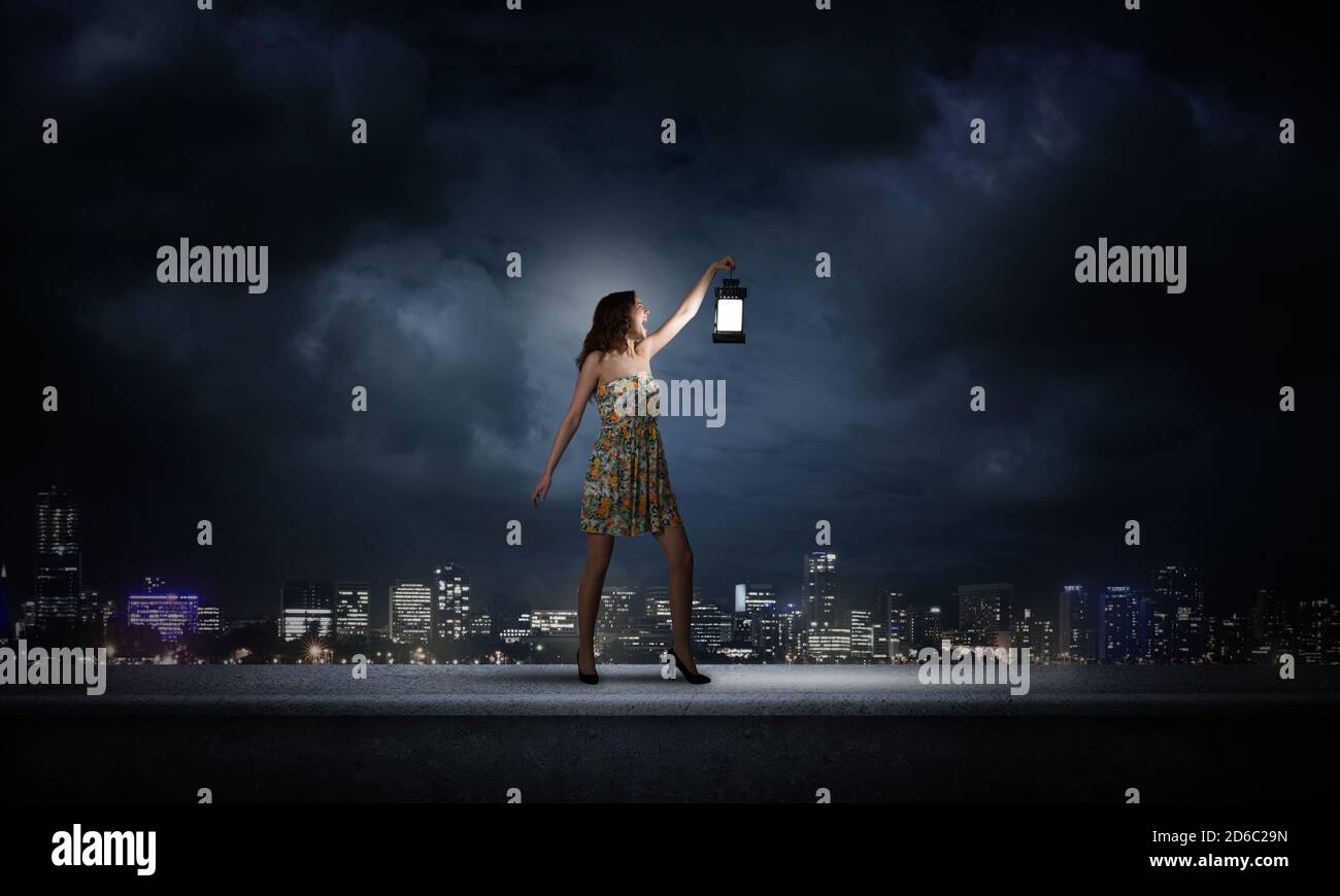 Girl lost in darkness Stock Photo - Alamy