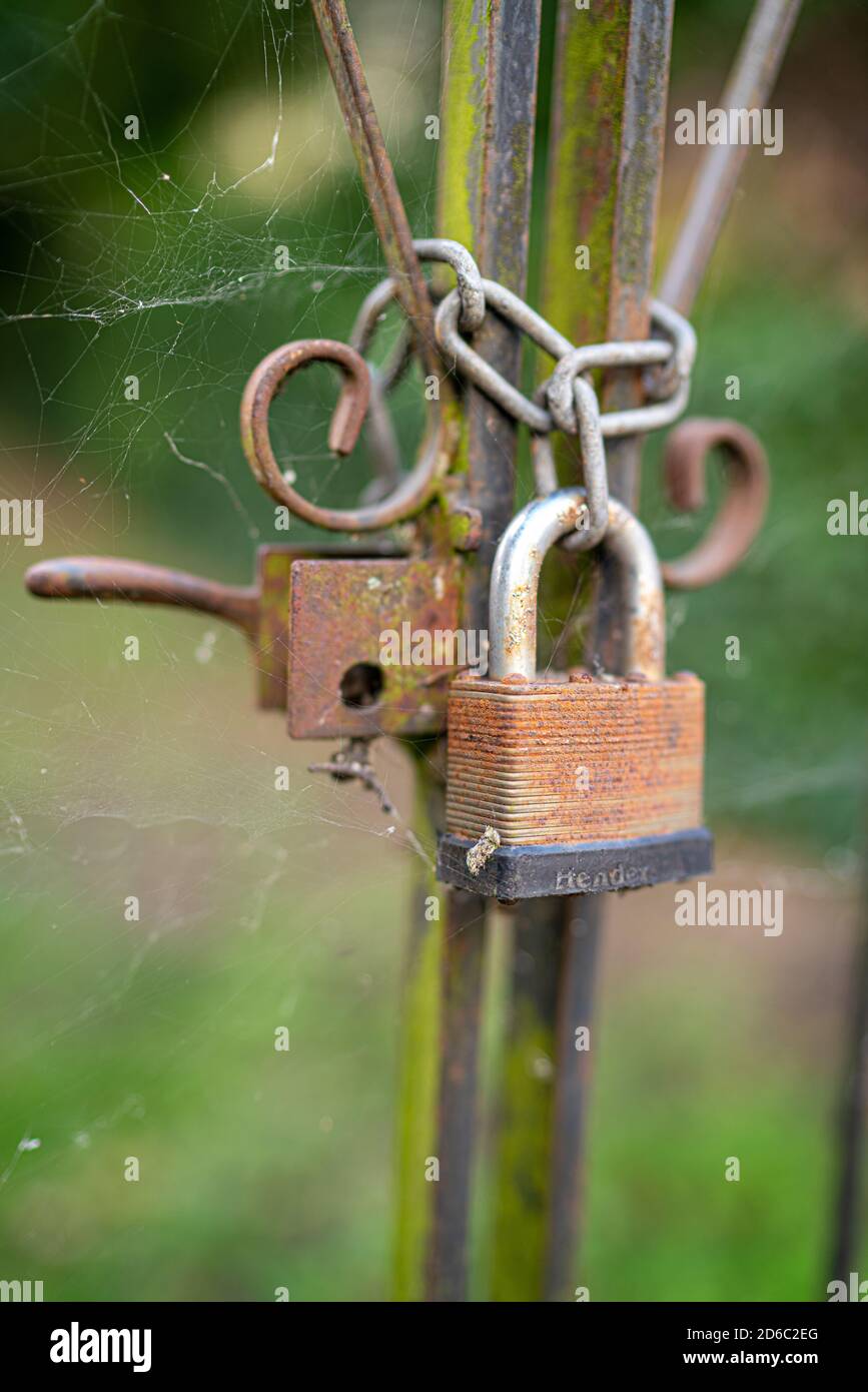 Padlocks, security, obsolete old lock and chains, plastic rapped link ...