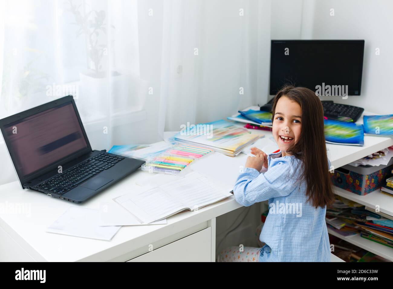 education and school online concept - smiling little student girl with ...