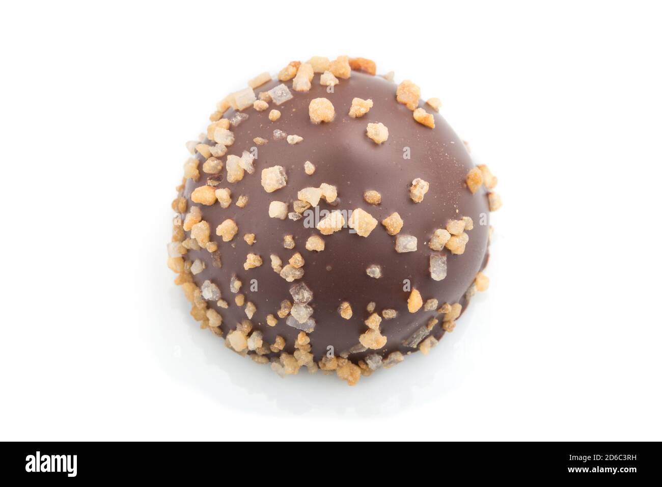 Single chocolate candy isolated on white background. side view, close ...