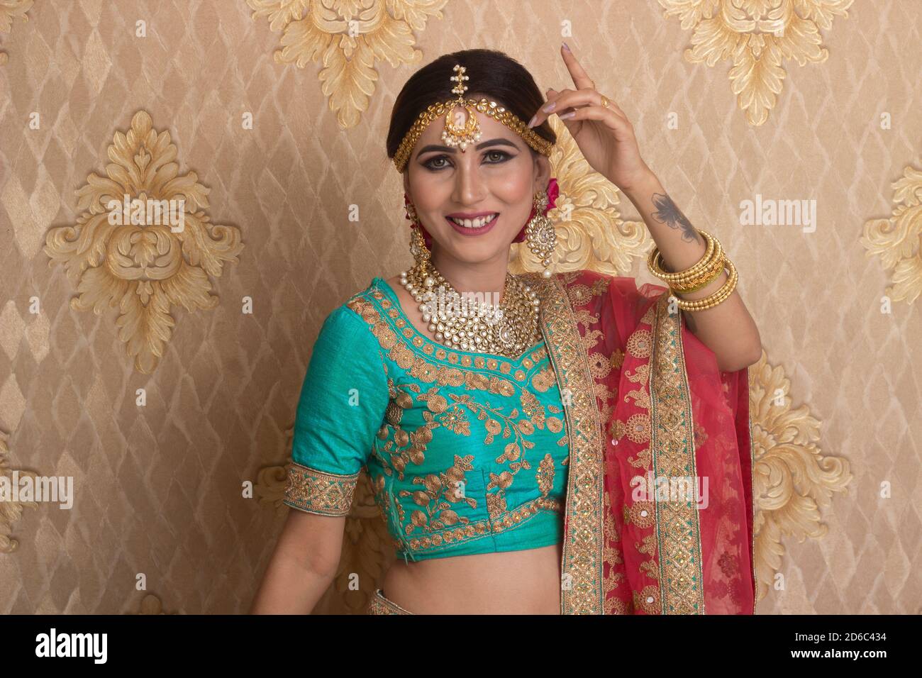 Indian model wearing traditional Maharashtrian bridal green sari and ...