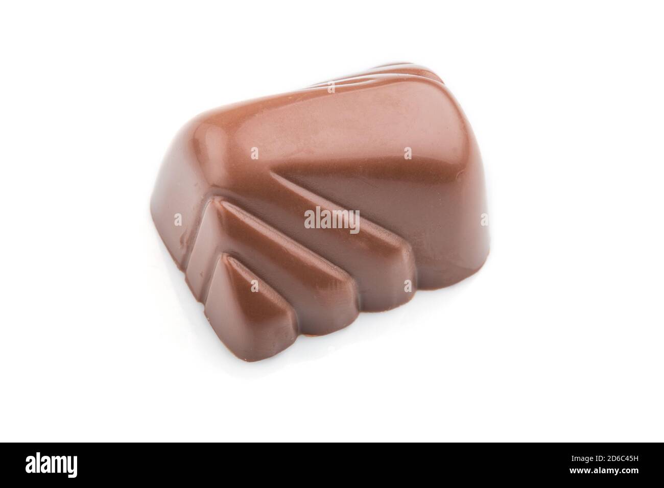 Single chocolate candy isolated on white background. side view, close ...