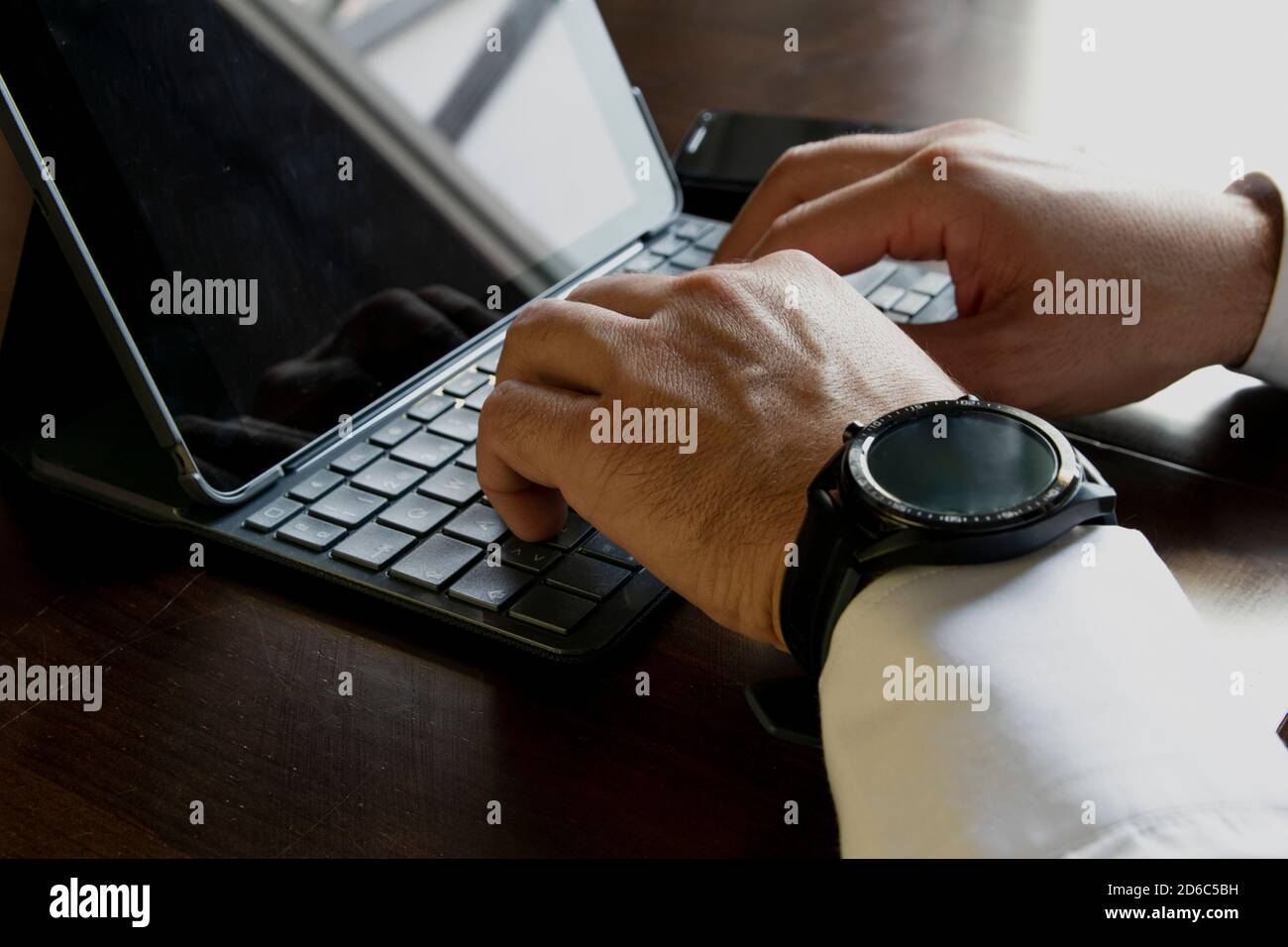 Typing on keypad smartwatch hi-res stock photography and images - Alamy