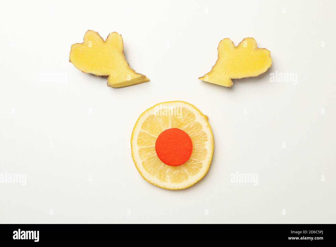 Deer antlers made of ginger and lemon on white background Stock Photo ...