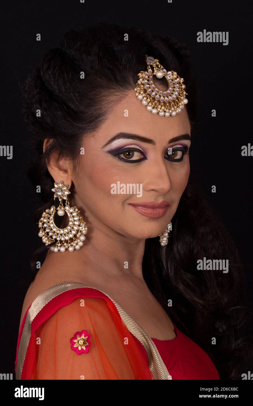 Indian model in ethnic Indian dress. Smiling at camera. Face close-up ...