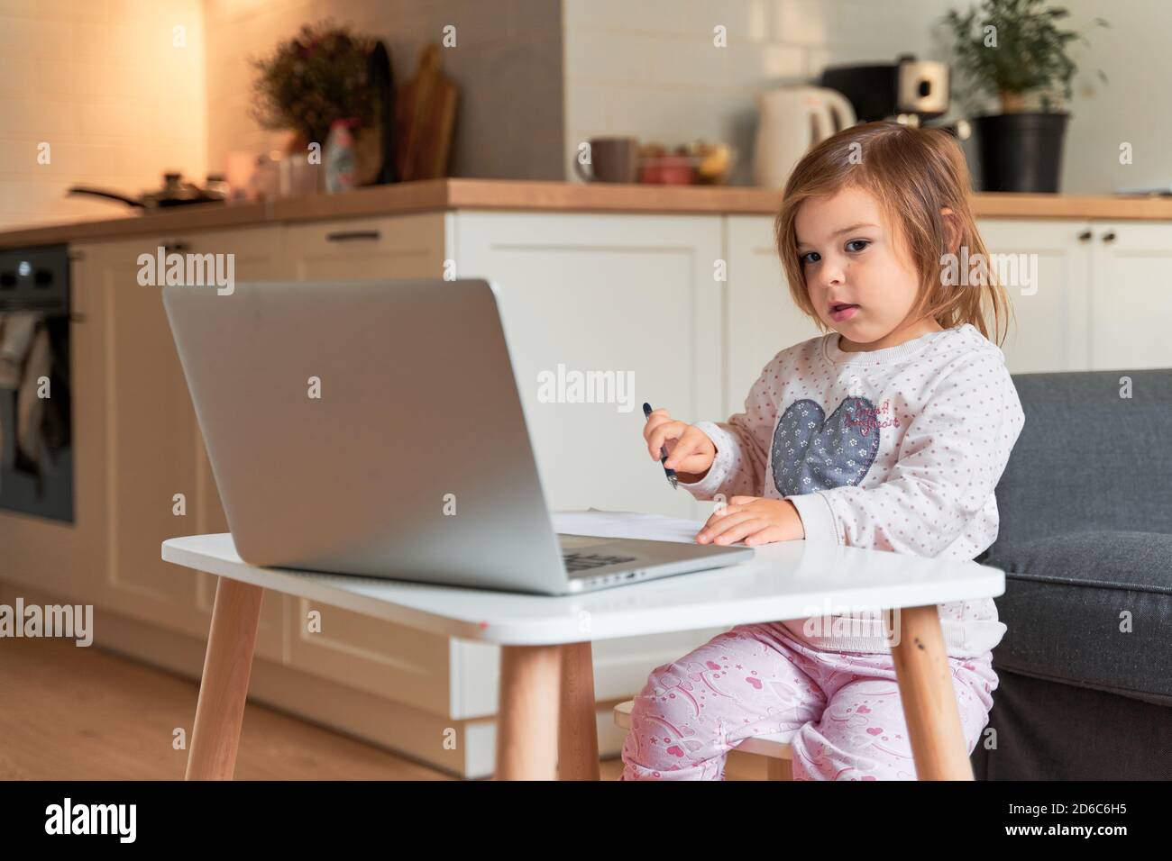 toddler girl e-learning at home. preschool online class Stock Photo - Alamy