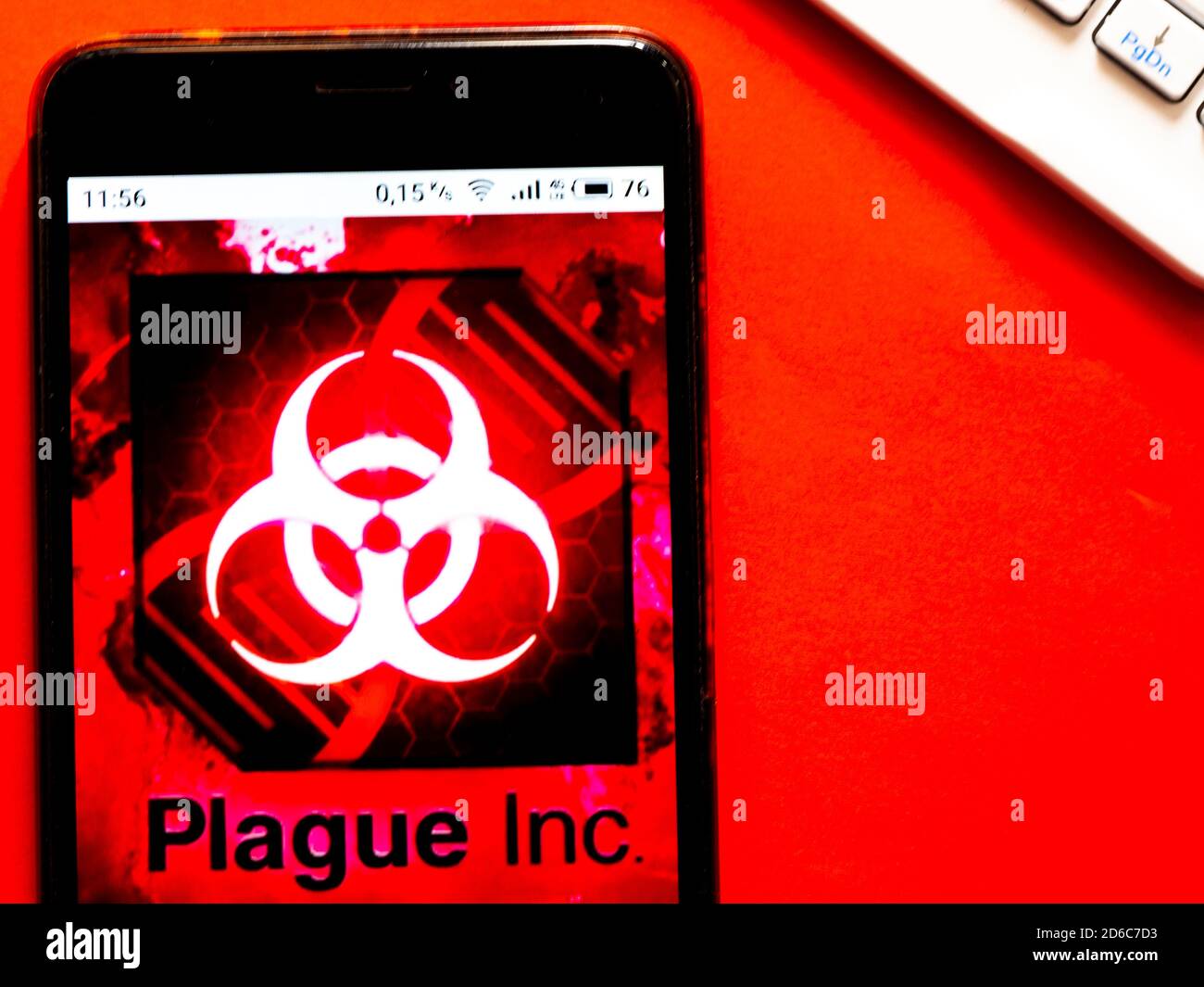 In this photo illustration a Plague Inc. appliance by Ndemic Creations ...