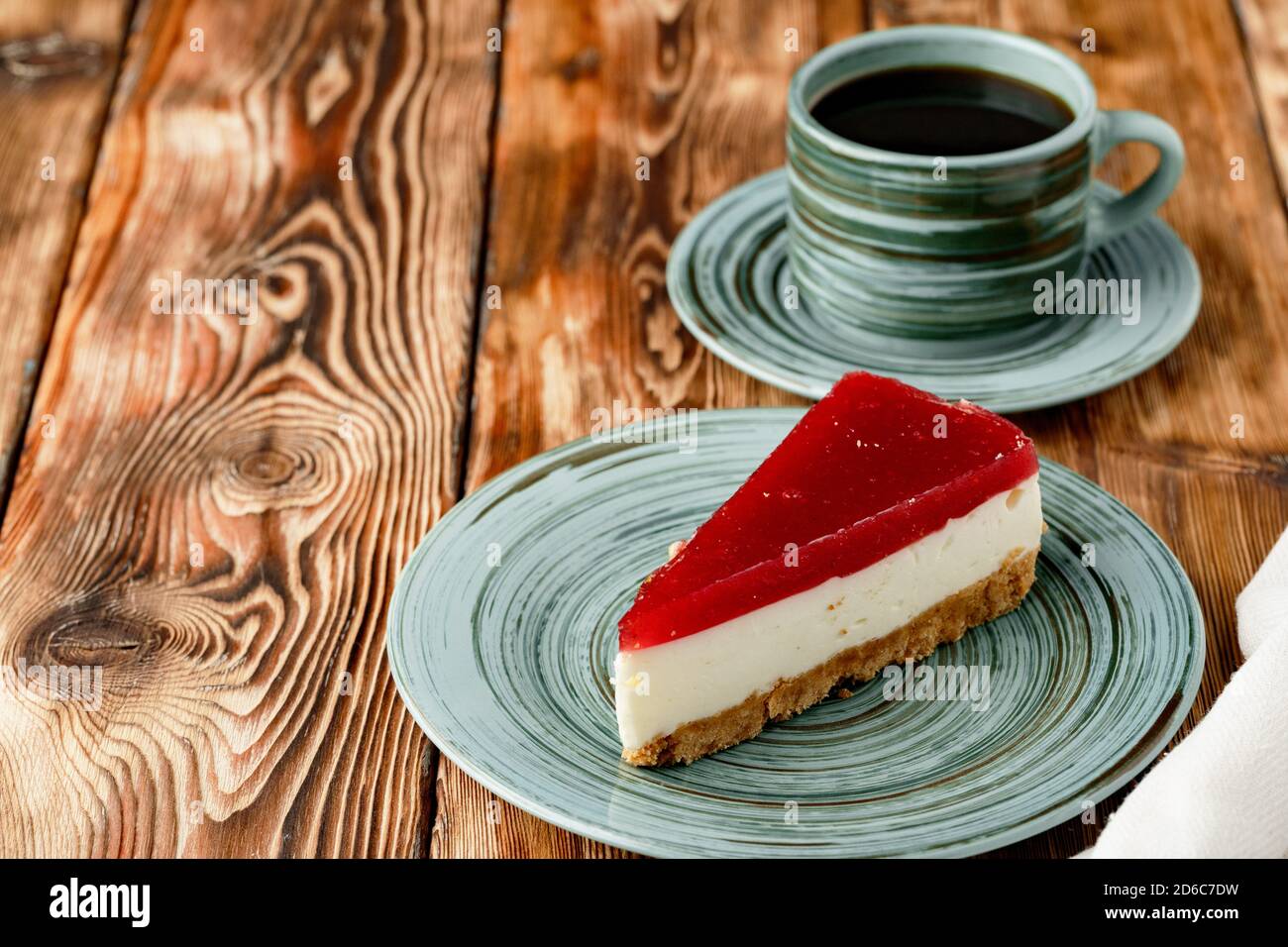 Layered mousse cake piece with berry topping Stock Photo - Alamy