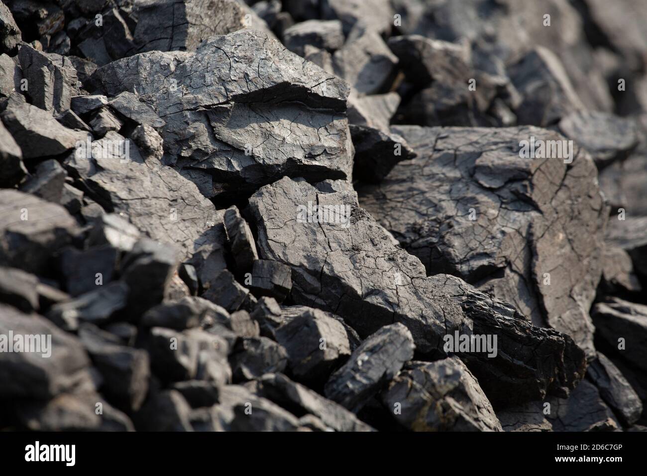 Texture of black raw coal in the mine, big and small, random size Stock ...