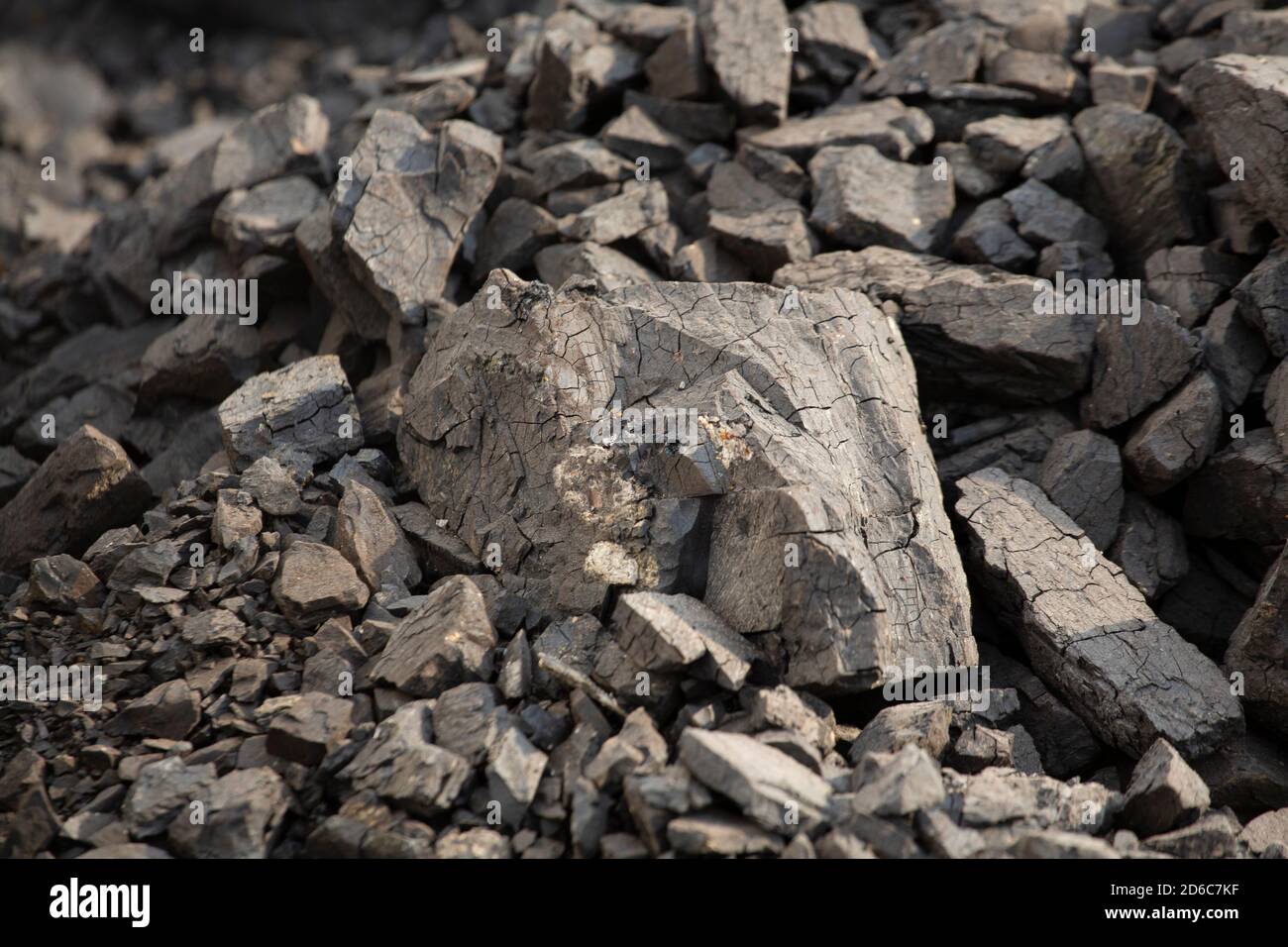 Texture of black raw coal in the mine, big and small, random size Stock ...