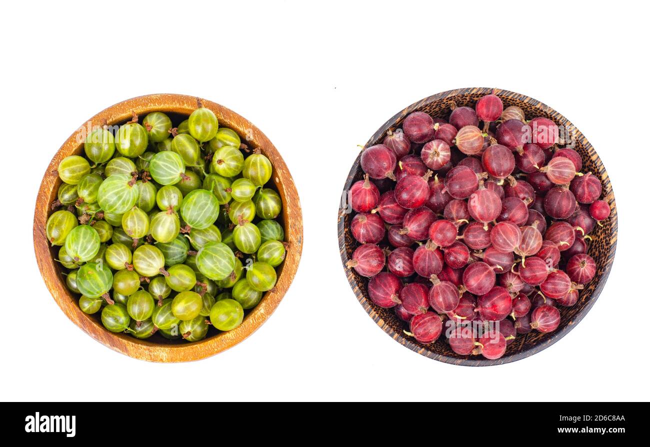 Organic berries, gooseberries in wooden bowl. Studio Photo Stock Photo ...