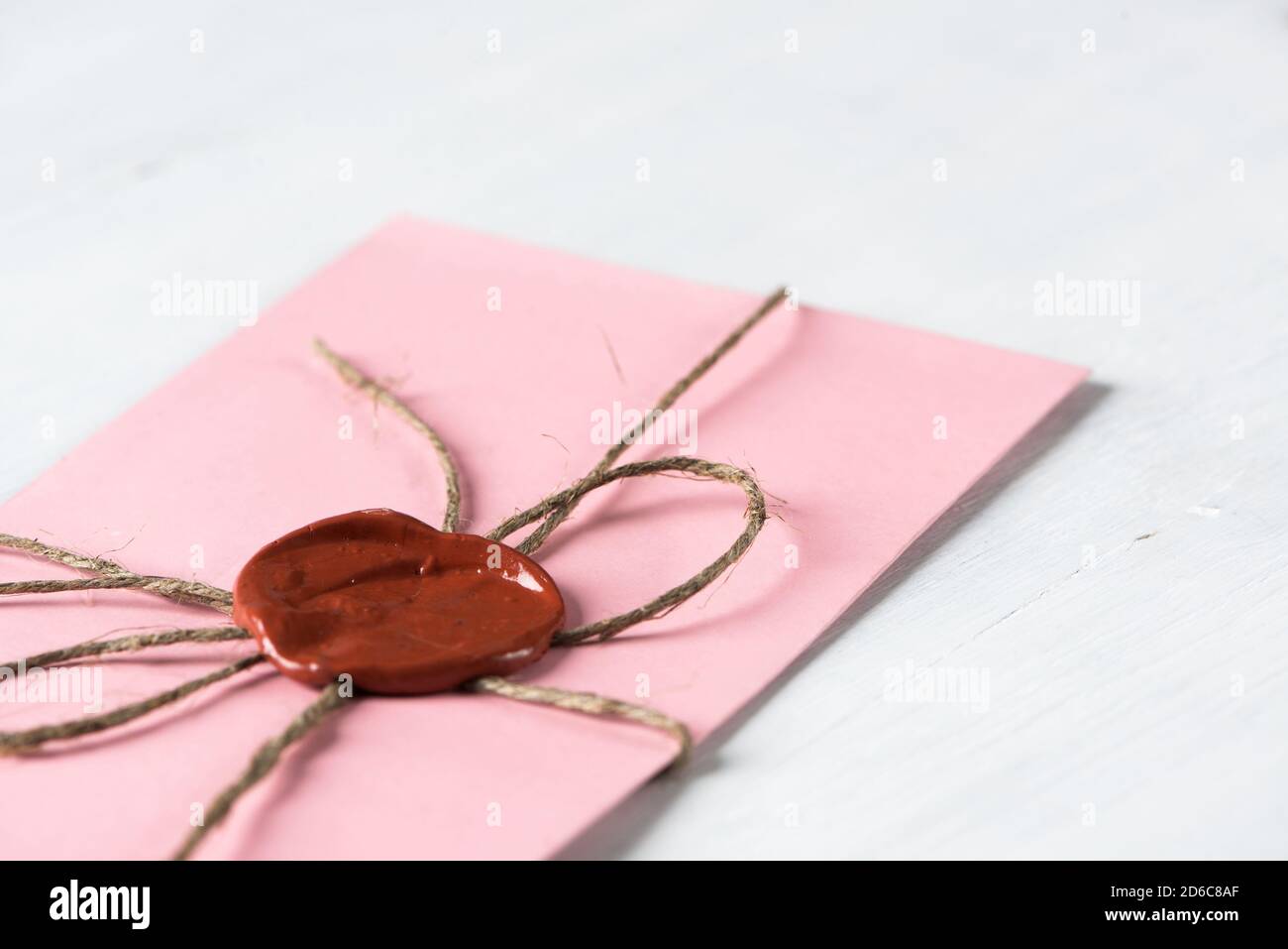 Letter with seal on table Stock Photo - Alamy