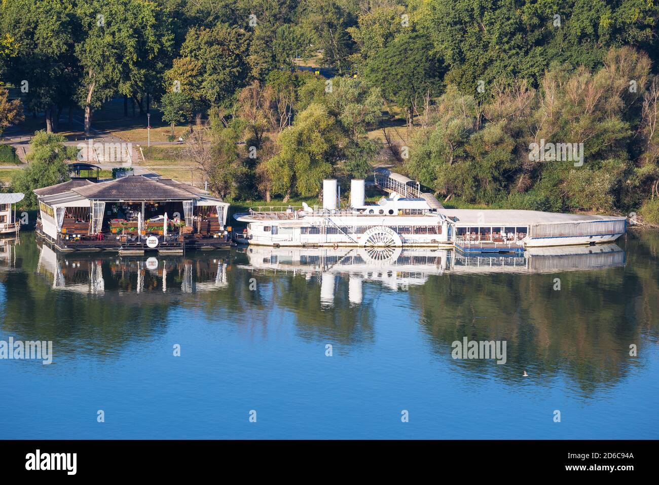 Serbia, Belgrade, View of floating bars and nightclubs on Sava River ...