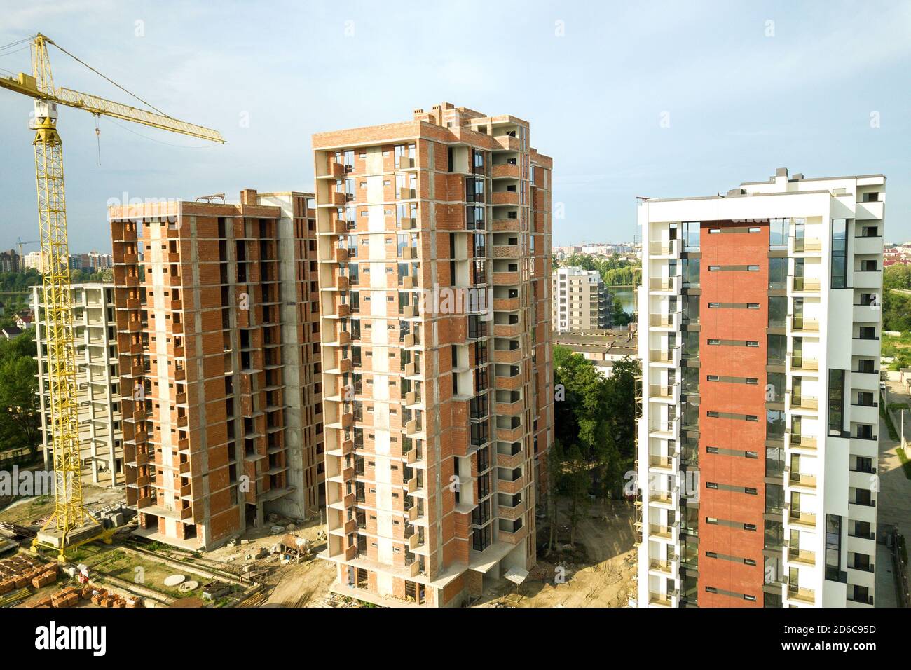 High-rise residential apartment buildings and tower crane under ...