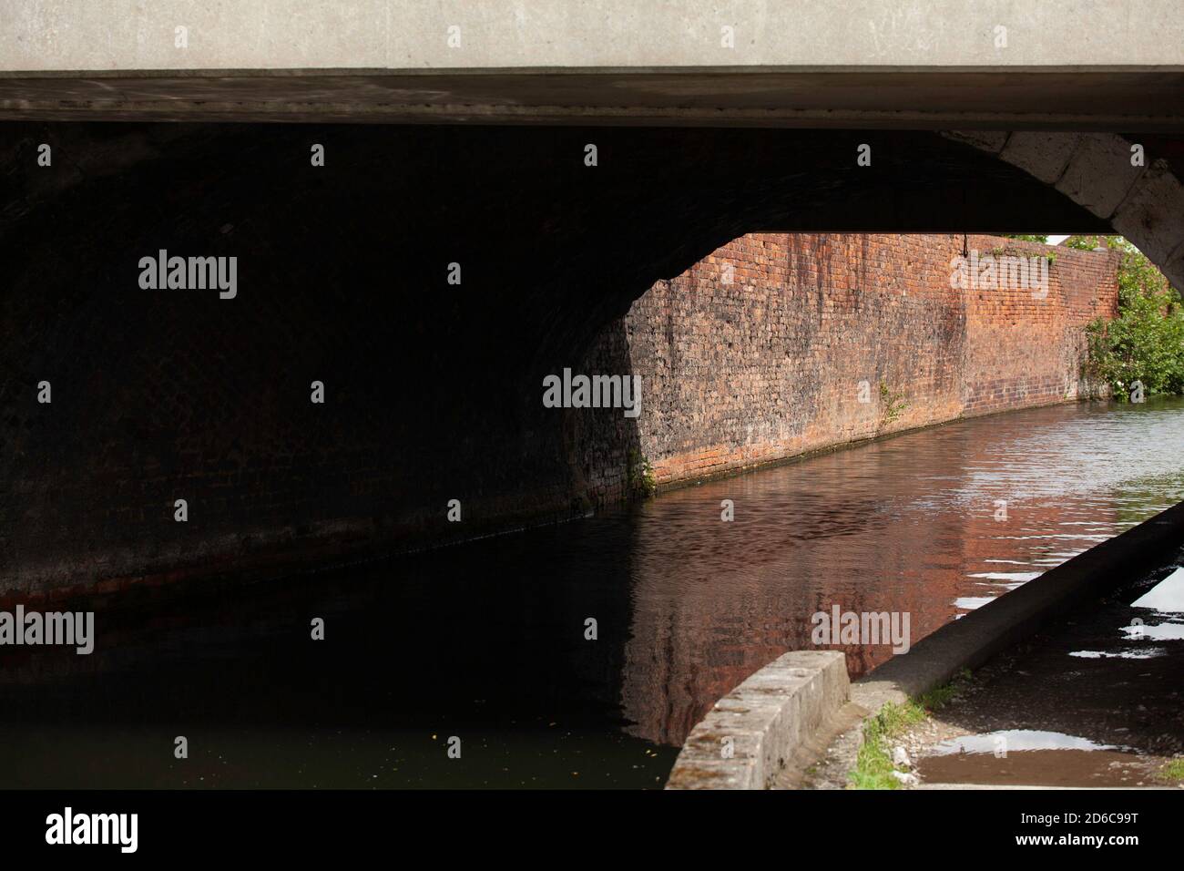 Light shining on the Ashton Canal in Ancoats Manchester Stock Photo - Alamy