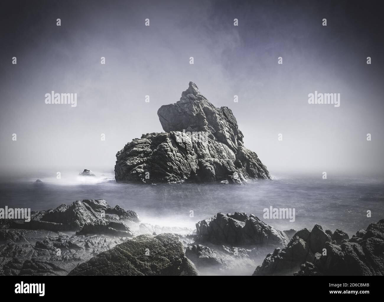 Foggy rocks and sea, dream image Stock Photo - Alamy