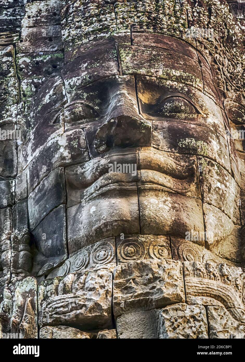 Ancient stone face smile Bayon Temple Angkor Thom Cambodia Khmer ...