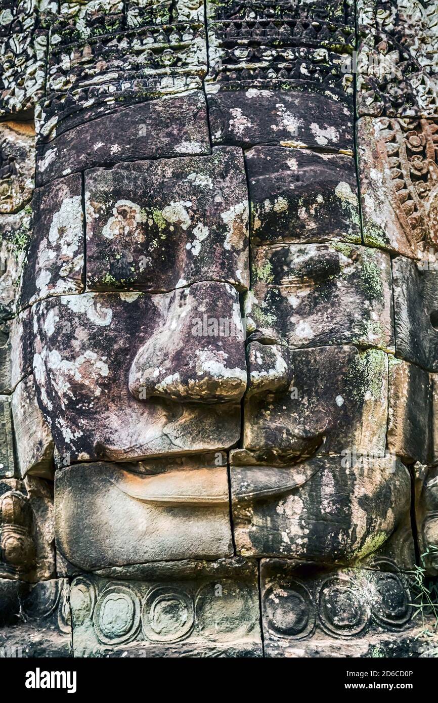Stone bas relief Mysterious Smile Buddha Stock Photo - Alamy