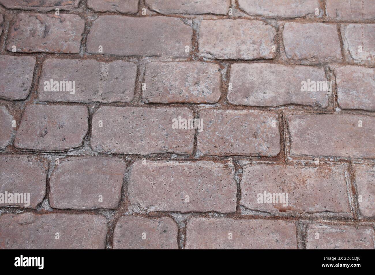 Textured concrete imprinted cobble driveway, textured background Stock ...