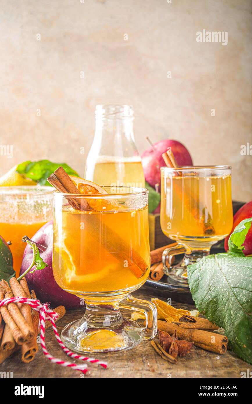 Traditional autumn winter alcohol drink. Hot and spicy apple cider ...