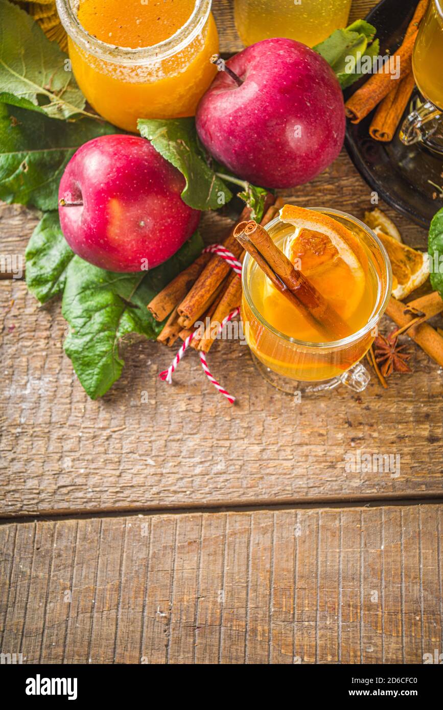 Traditional autumn winter alcohol drink. Hot and spicy apple cider ...