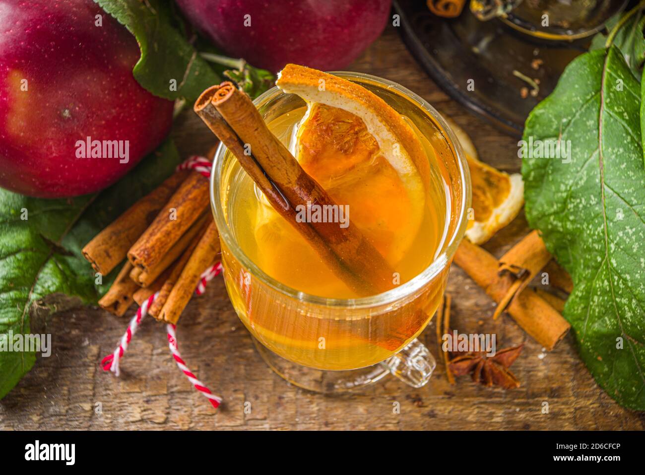 Traditional autumn winter alcohol drink. Hot and spicy apple cider ...