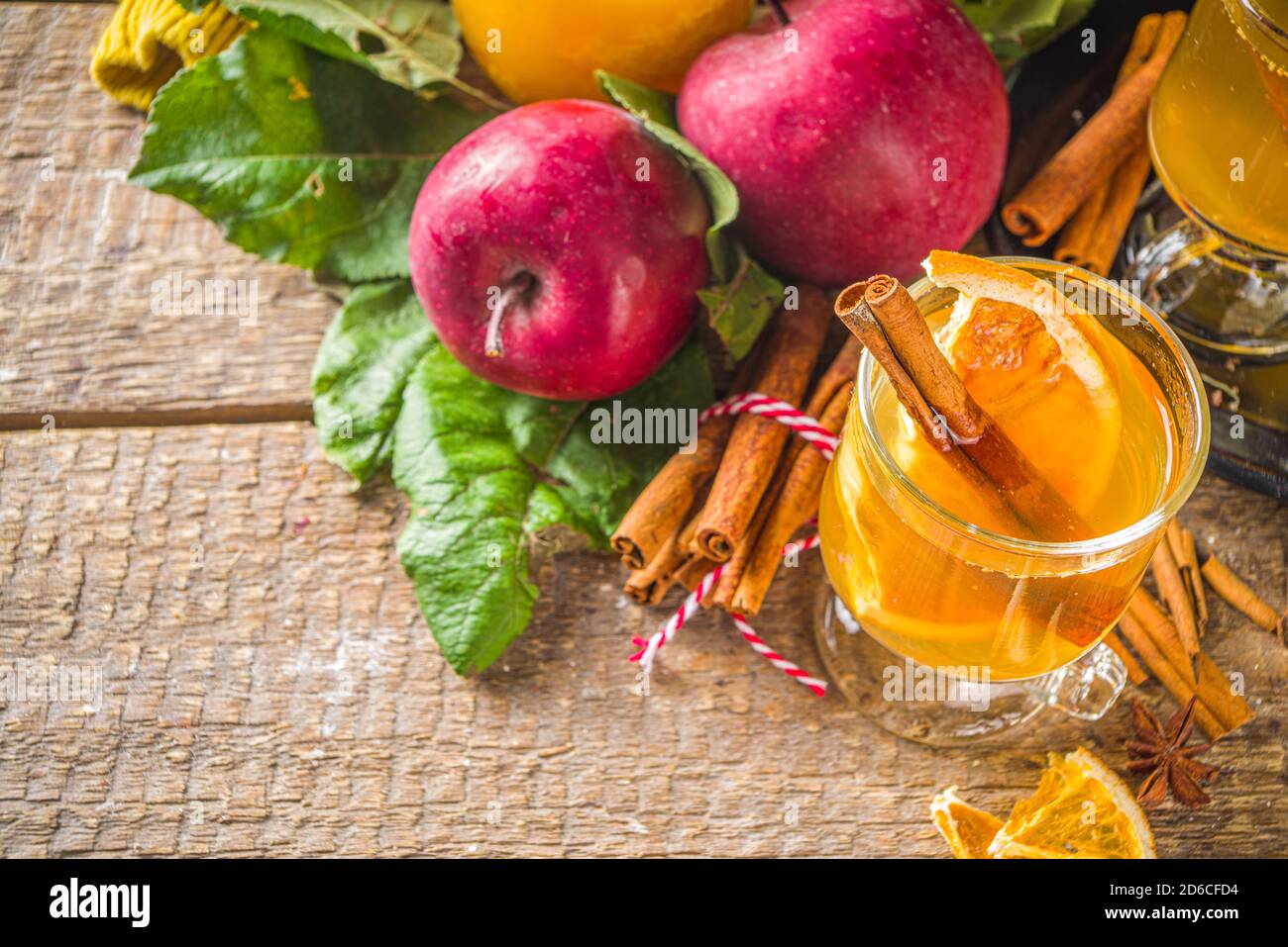Traditional autumn winter alcohol drink. Hot and spicy apple cider ...