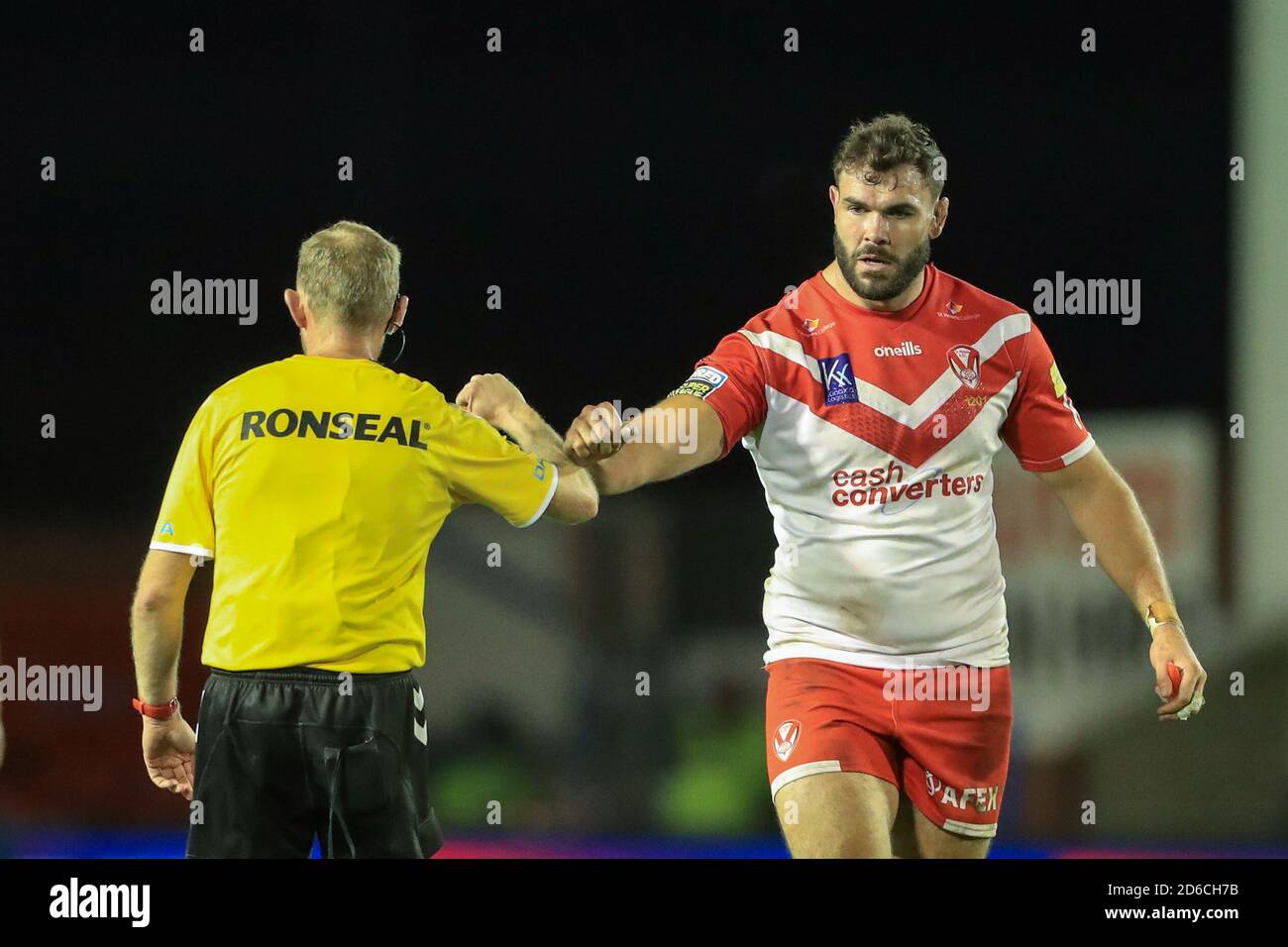 Alex Walmsley (8) of St Helens and referee Robert Hicks after the game ...