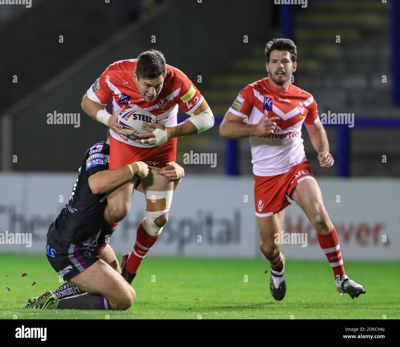 Louie McCarthy-Scarsbrook (13) of St Helens in action during the game ...