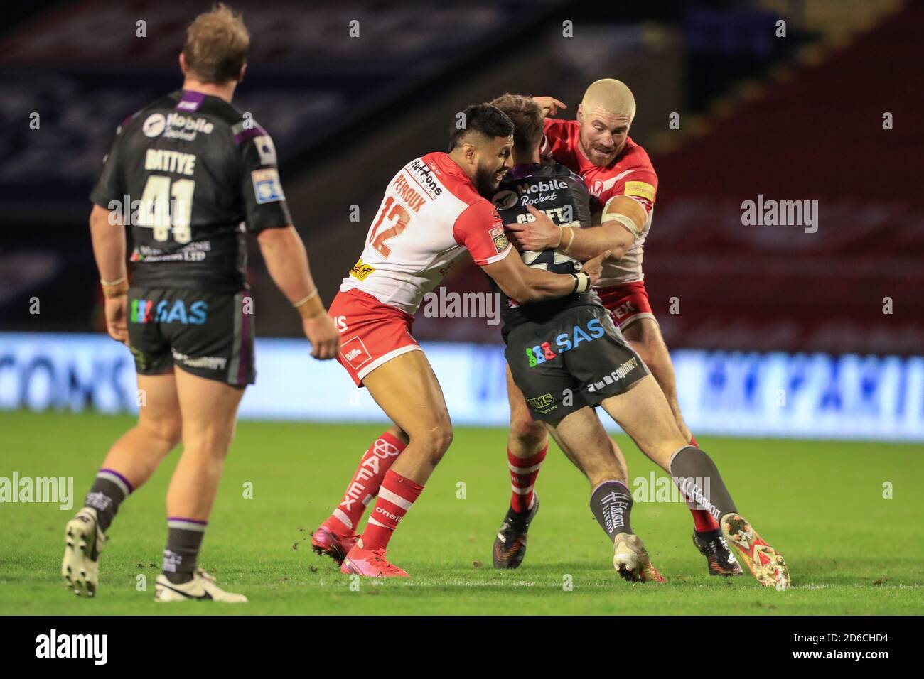 Kyle Amor (16) of St Helens and Dominique Peyroux (12) of St Helens ...