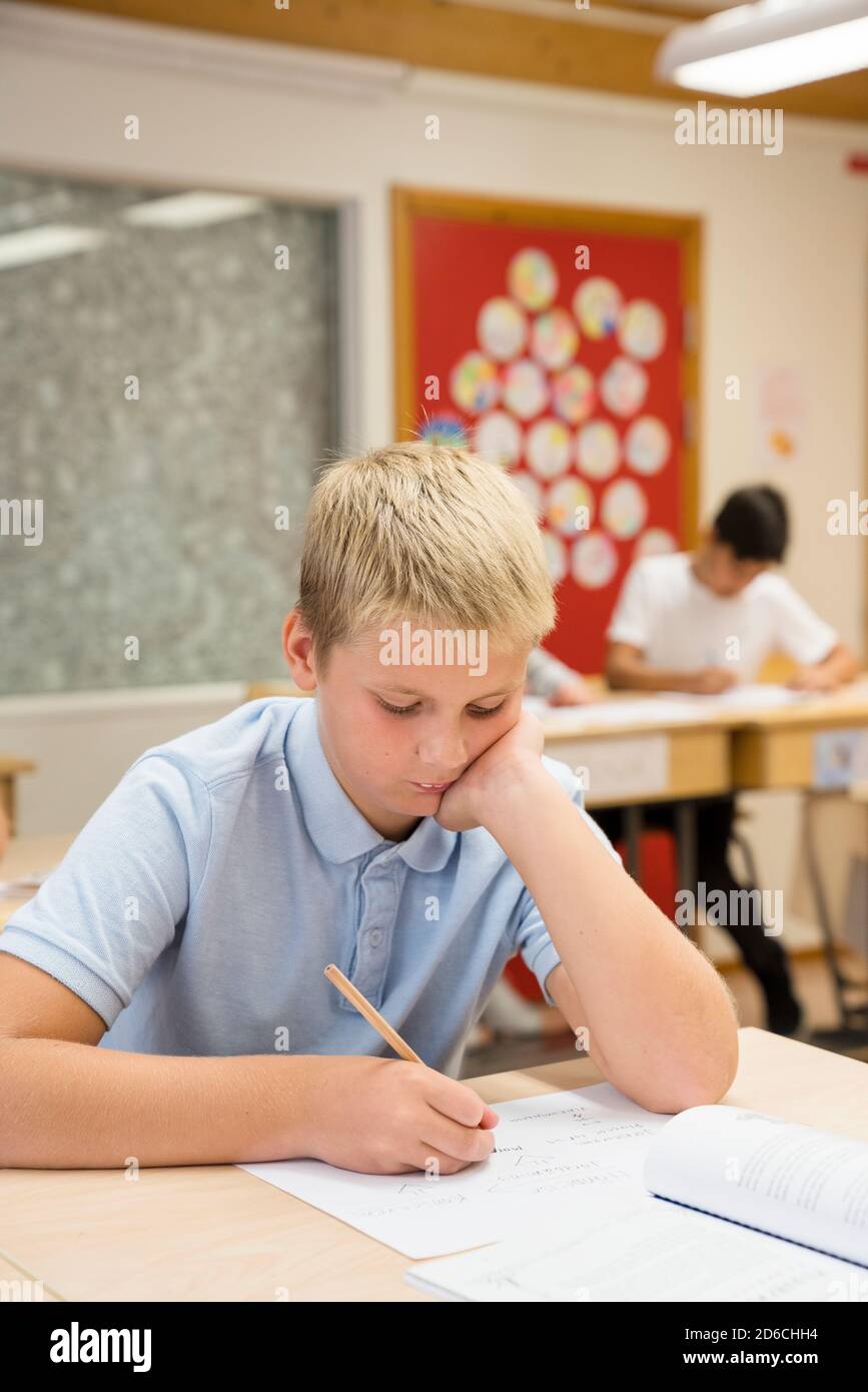 Boy in classroom Stock Photo - Alamy