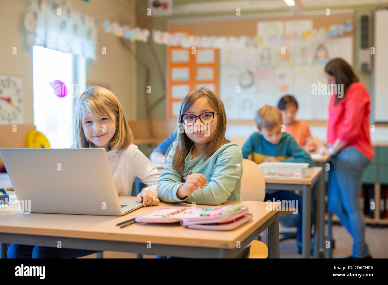 Girls in classroom Stock Photo - Alamy