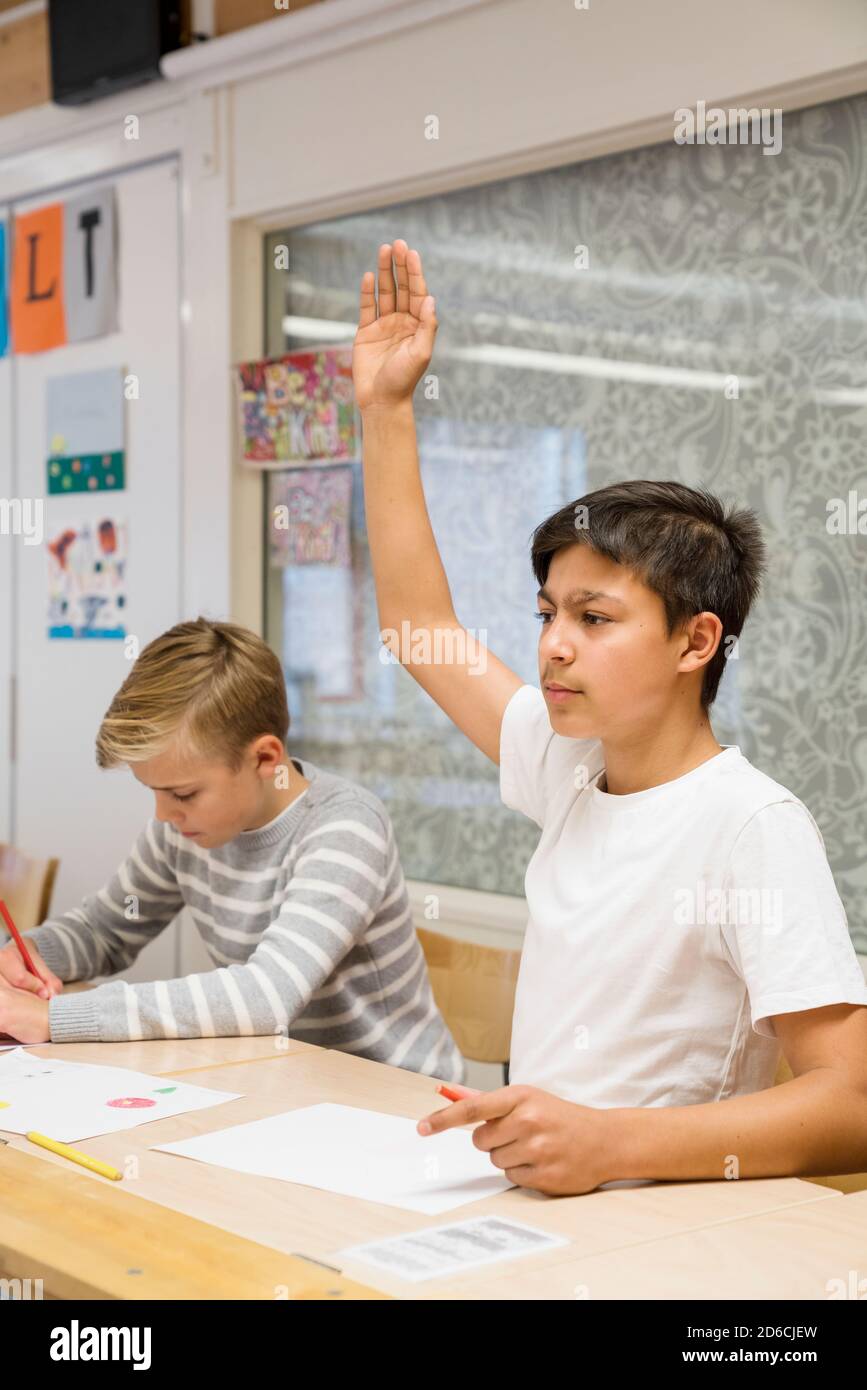 Boys in classroom Stock Photo - Alamy
