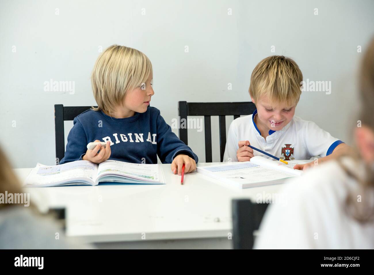 Boys in classroom Stock Photo - Alamy
